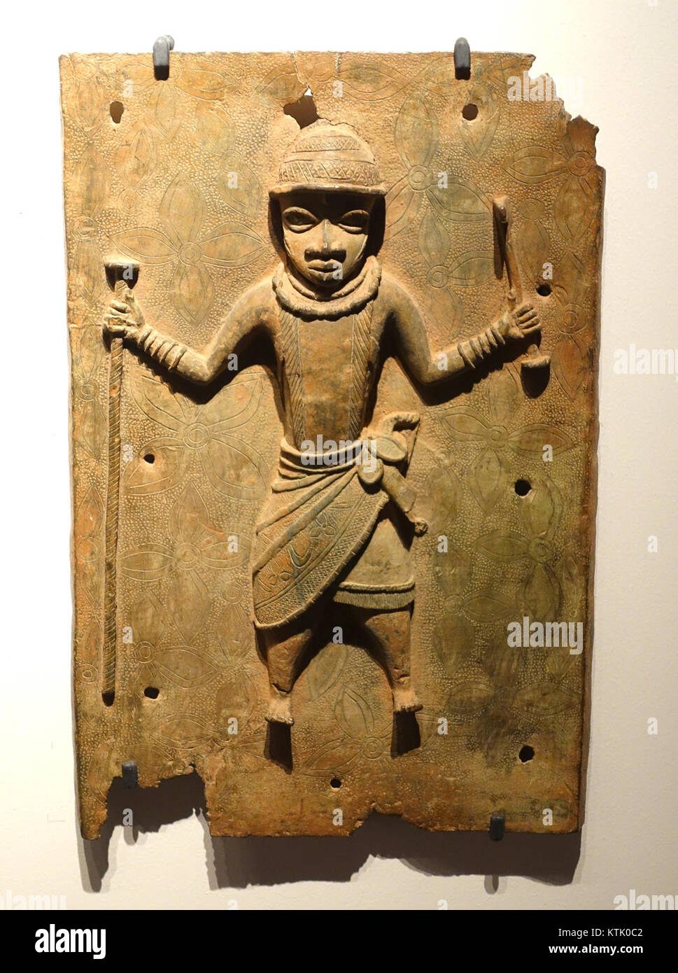This Benin plaque, housed in the Ethnological Museum in Berlin, is a ...