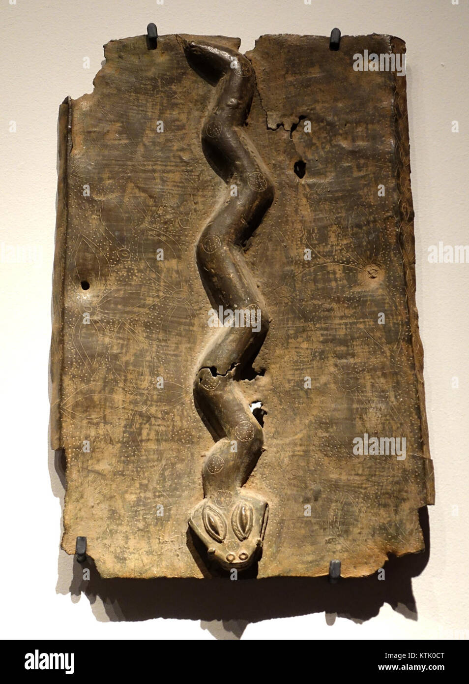 This Benin plaque, displayed in the Ethnological Museum in Berlin, is ...