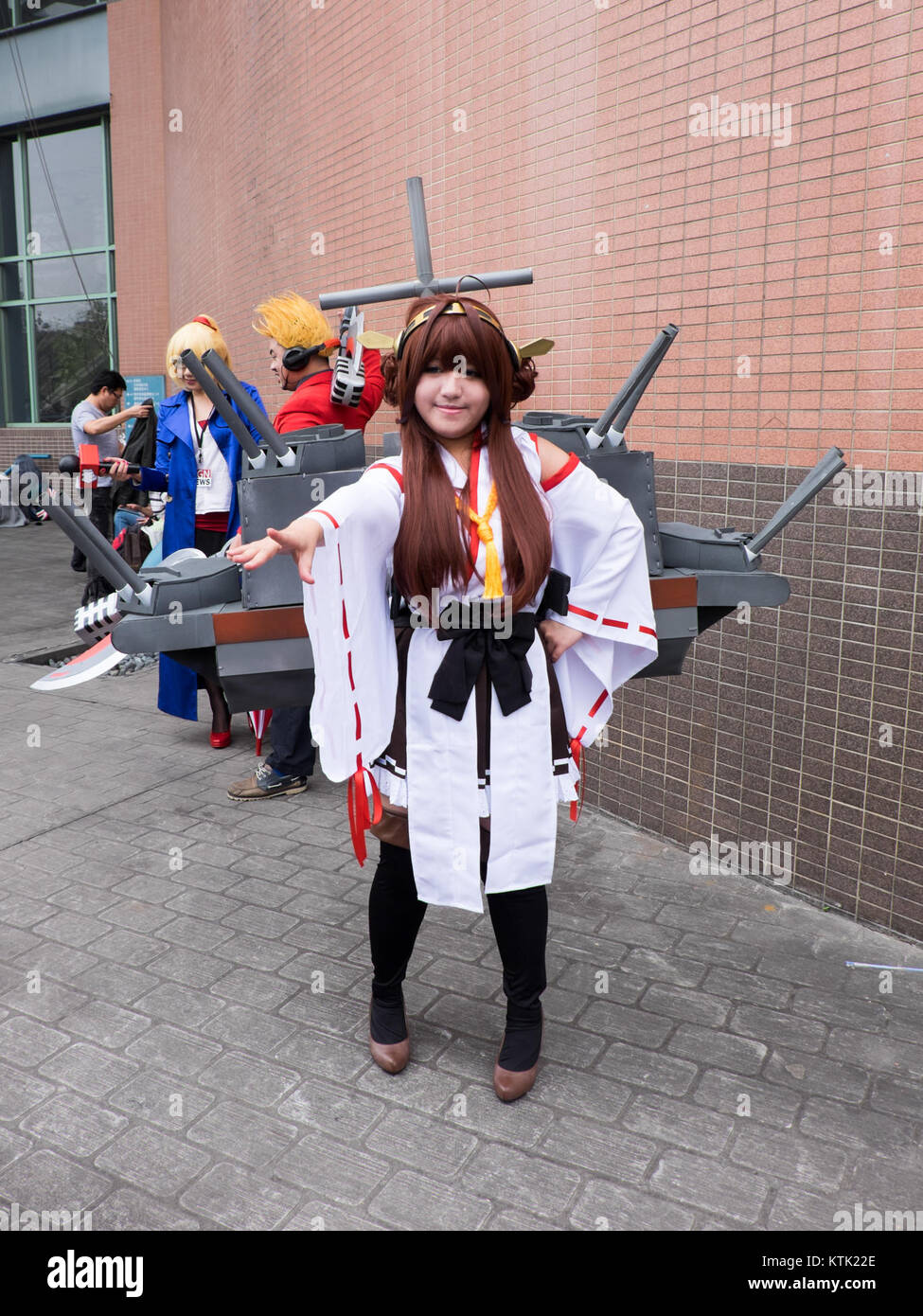 A cosplayer dressed as the Battleship Kongo Fleet Girl from the popular ...