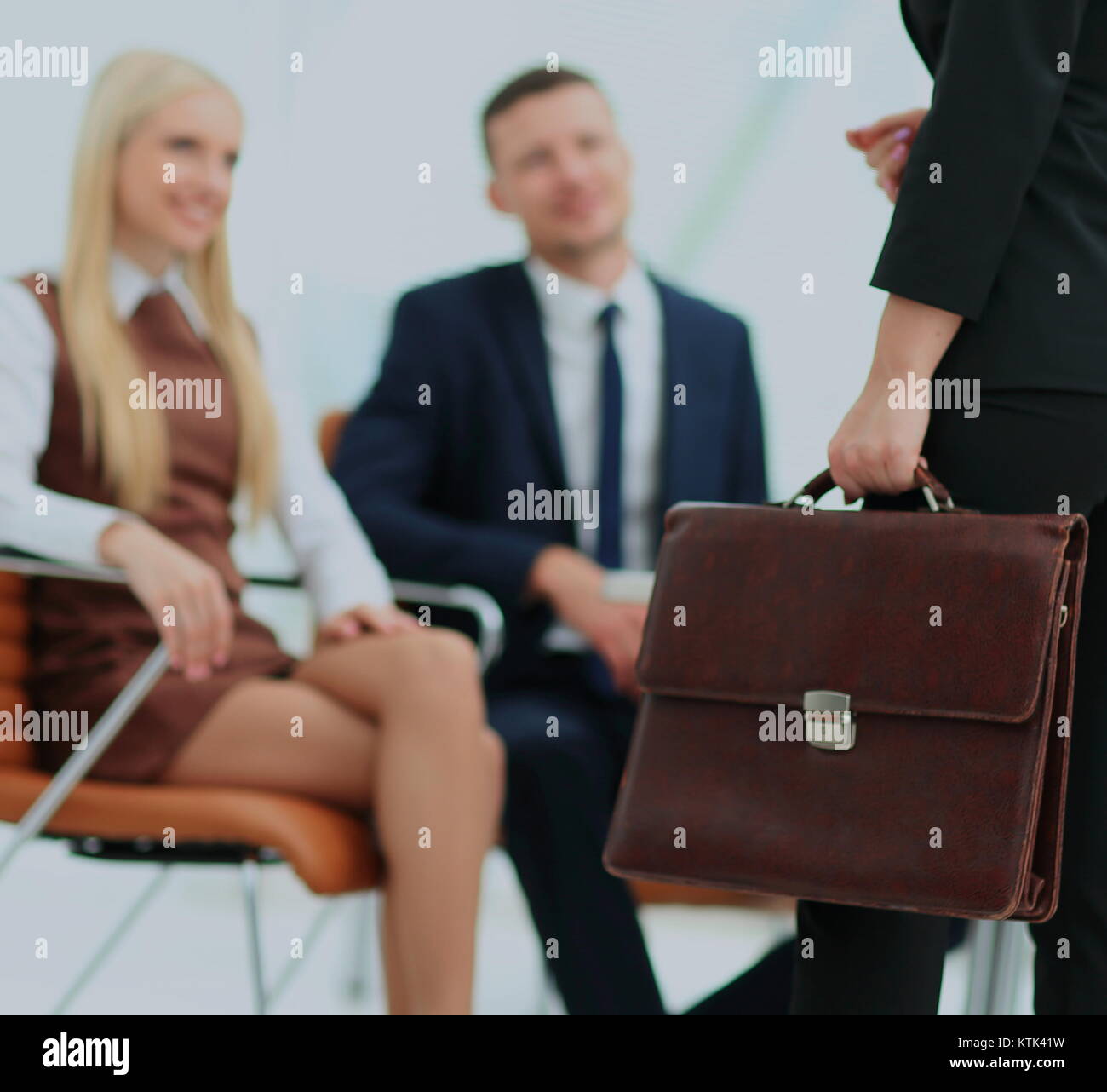 Close up portrait of a business woman with briefcase Stock Photo - Alamy