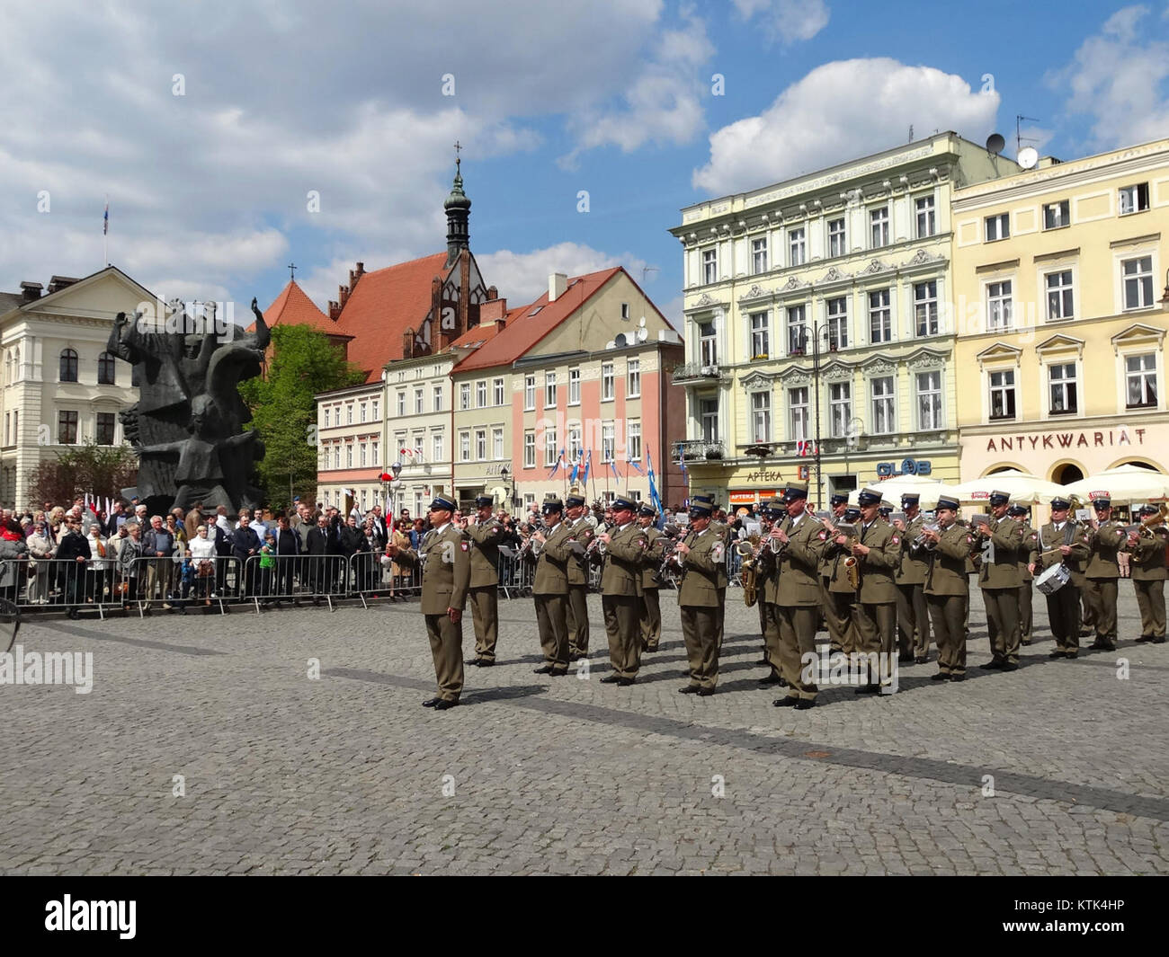 This image captures the 3 Maja celebrations at Stary Rynek, featuring a ...
