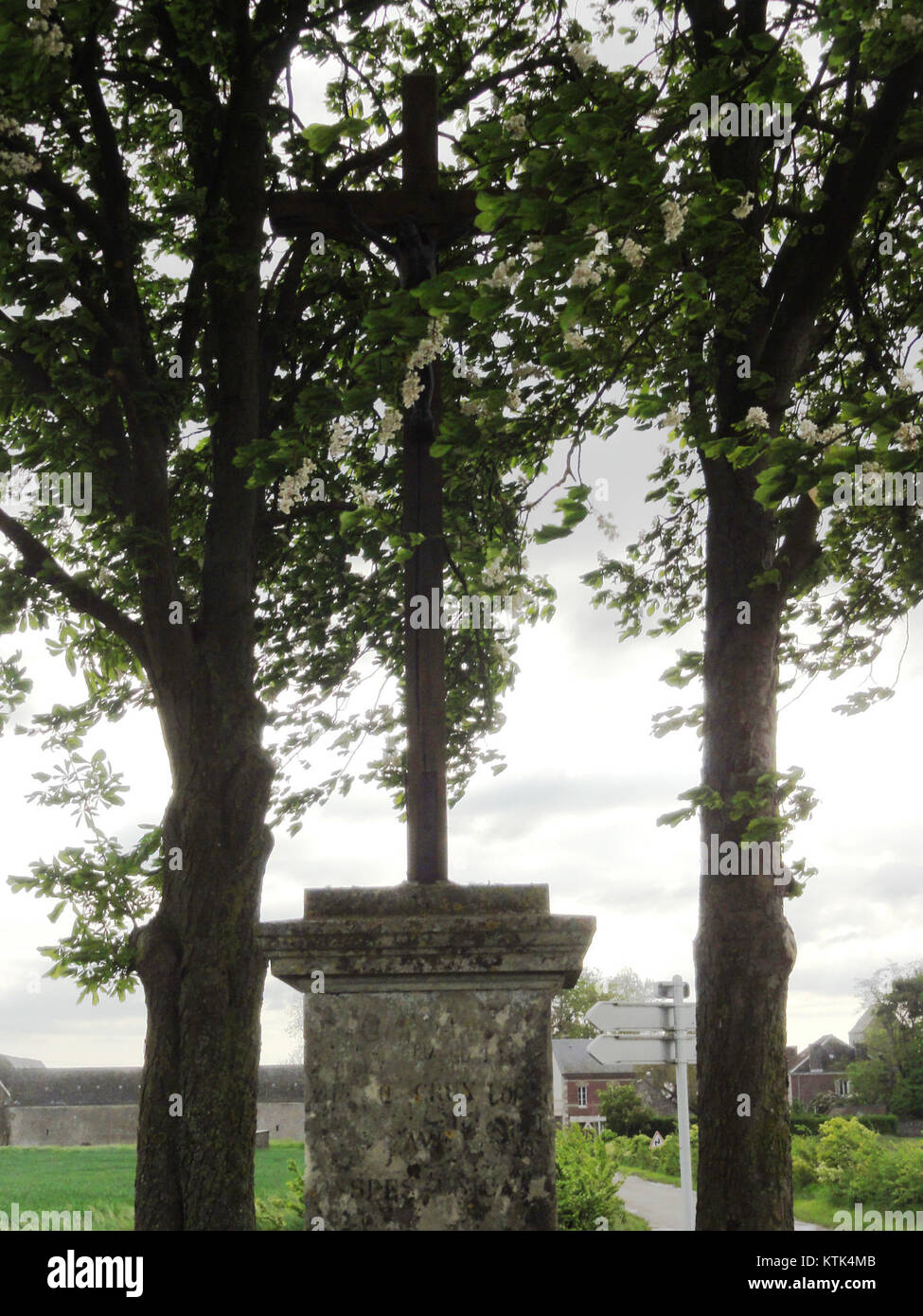 This image shows a crossroad monument, or 'croix de chemin,' in the ...