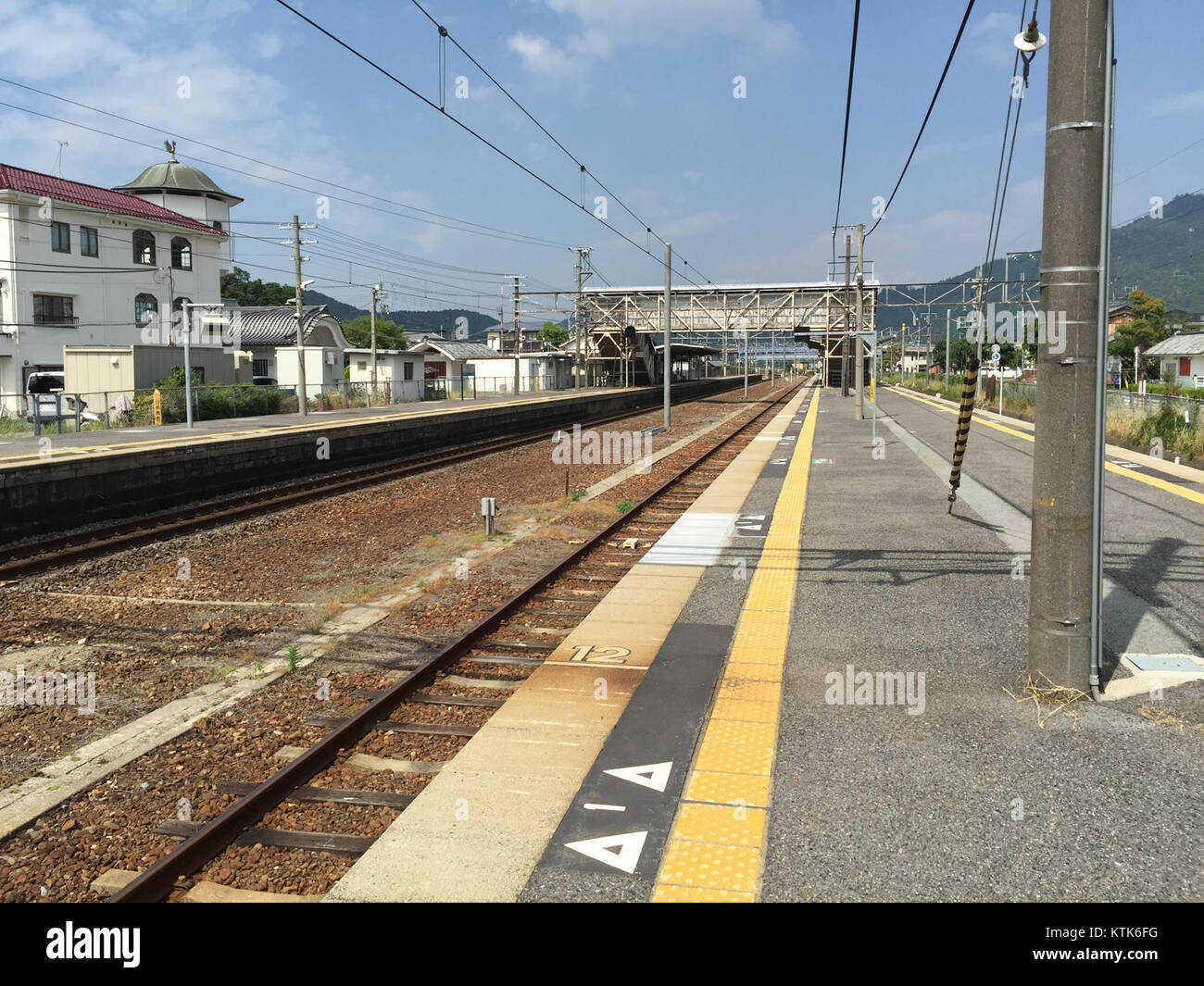 Azuchi Station, located in Japan, has platforms that offer a view to ...