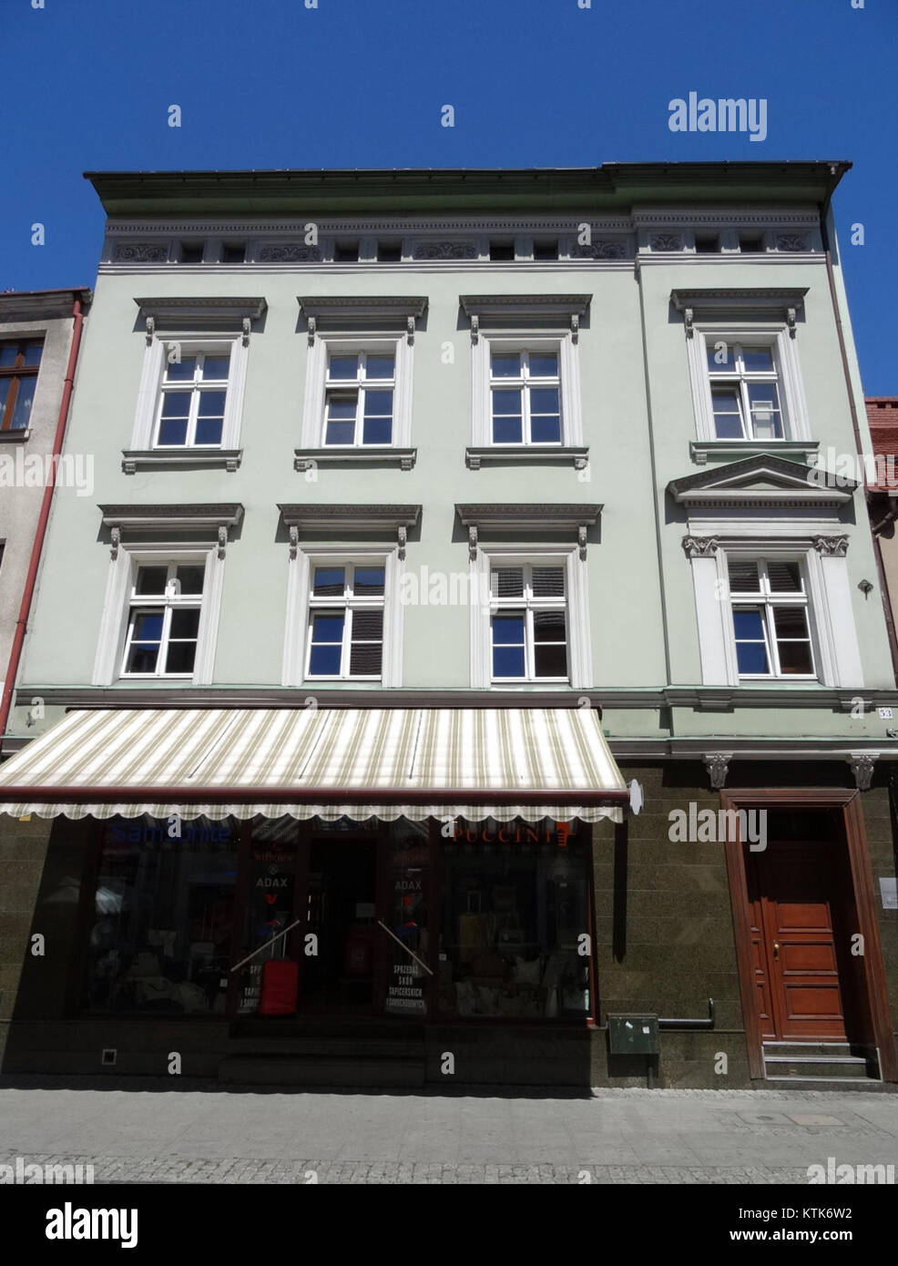 This image depicts a building located on Dluga Street in Poland. It was ...
