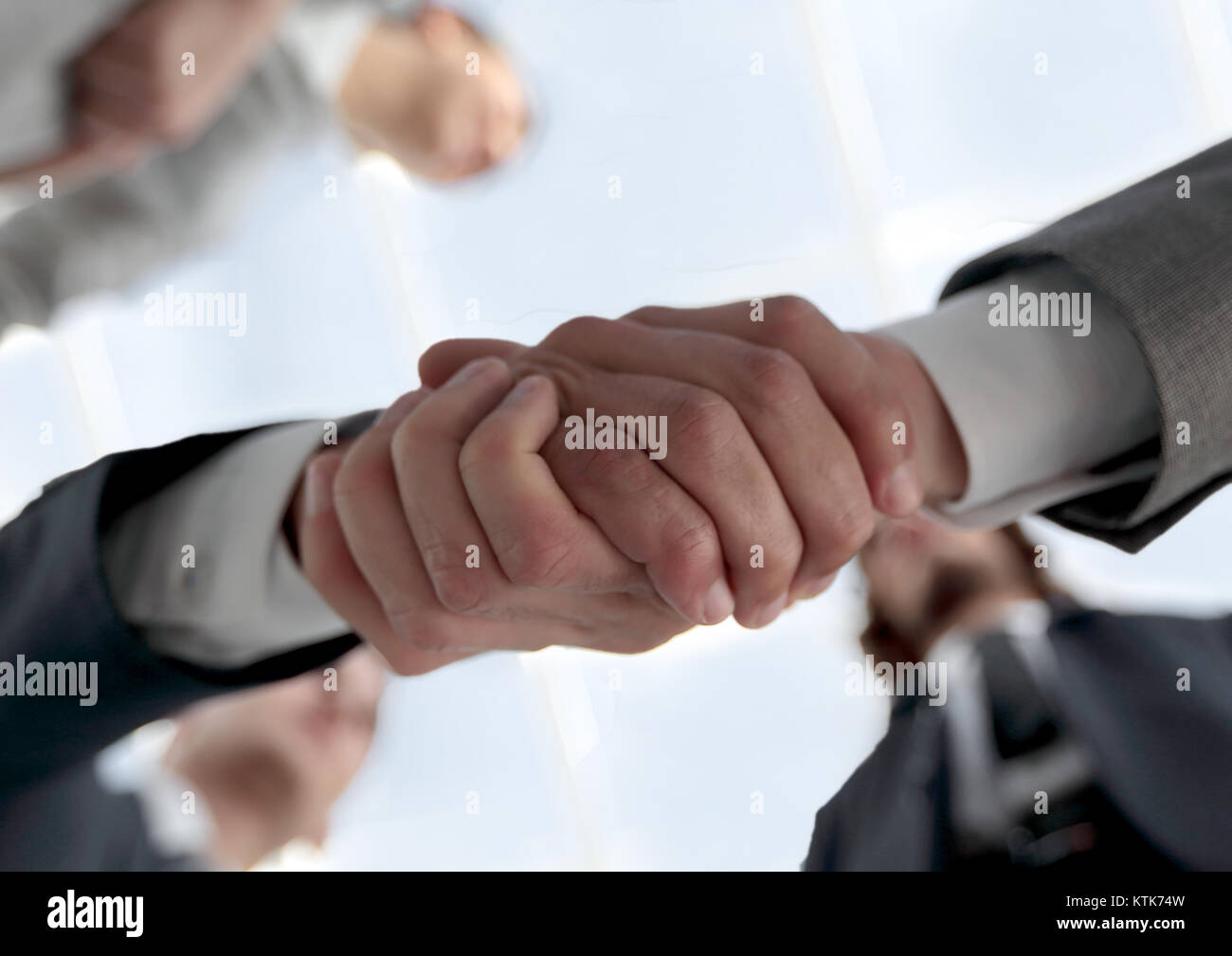 bottom view.business handshake Stock Photo - Alamy