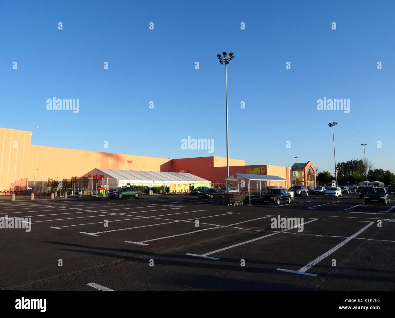 A photograph of the Auchan store building, located at 1 June 2015 ...