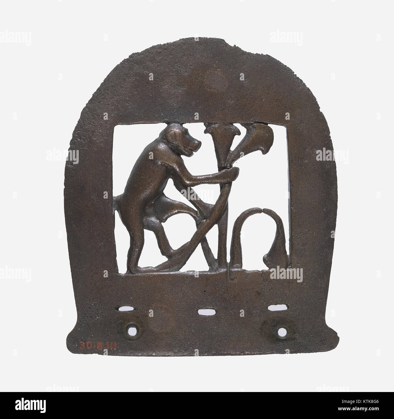 The Ax head with a monkey figure is an artifact from ancient or tribal ...