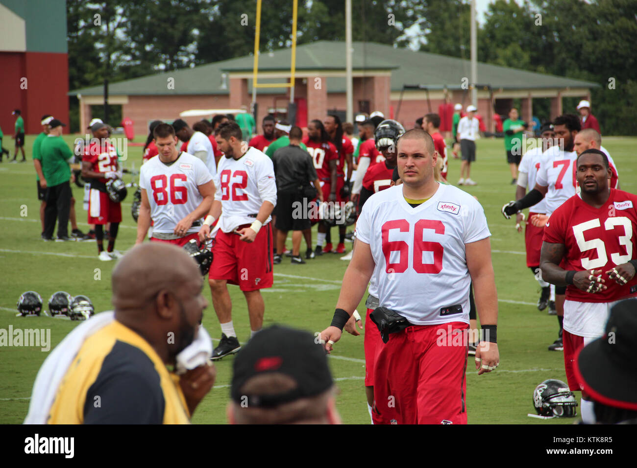 A photograph featuring four professional football players: Beau Gardner ...