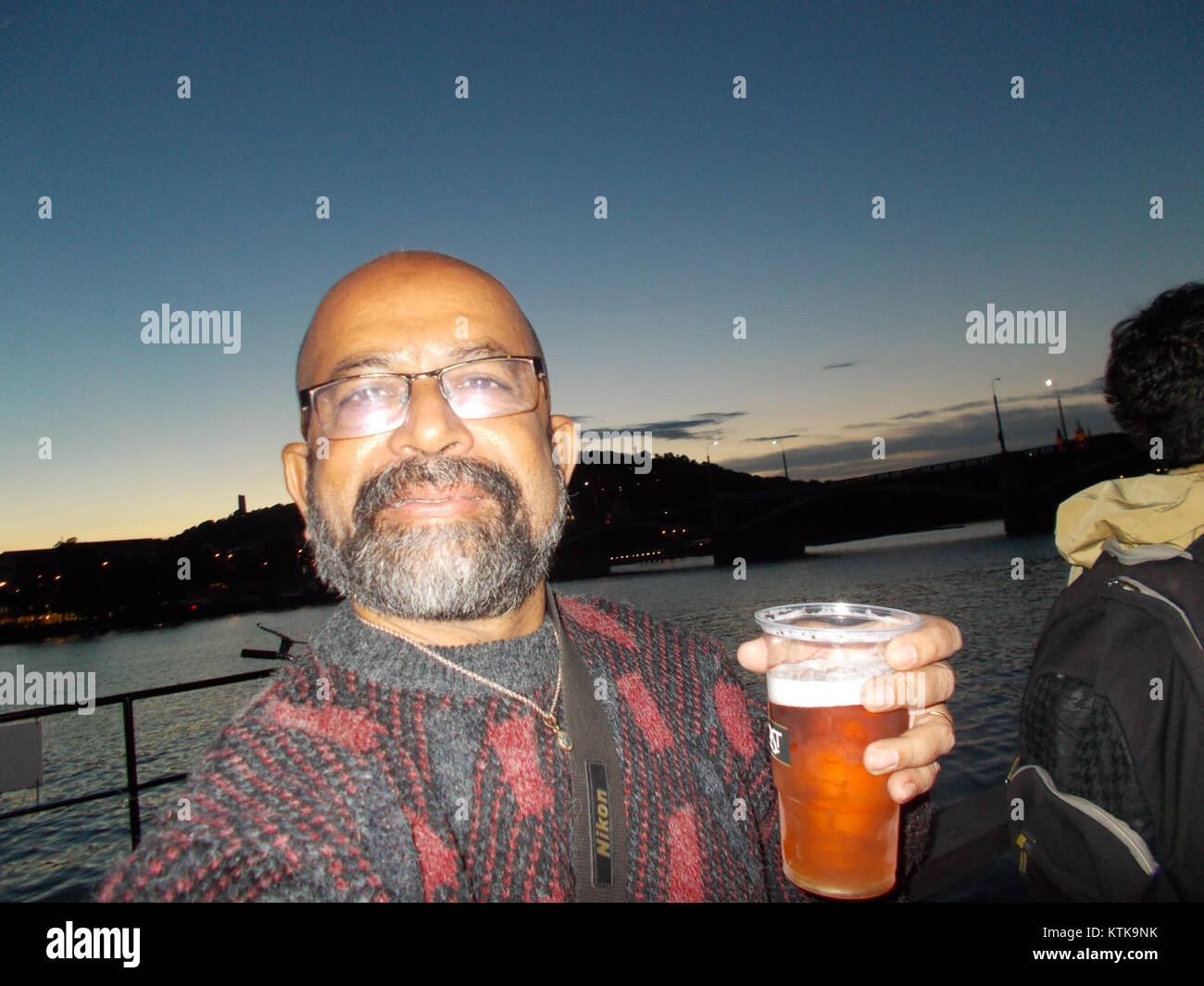 Backpacker tourists participate in a 'Barge Party' on the Vltava River ...