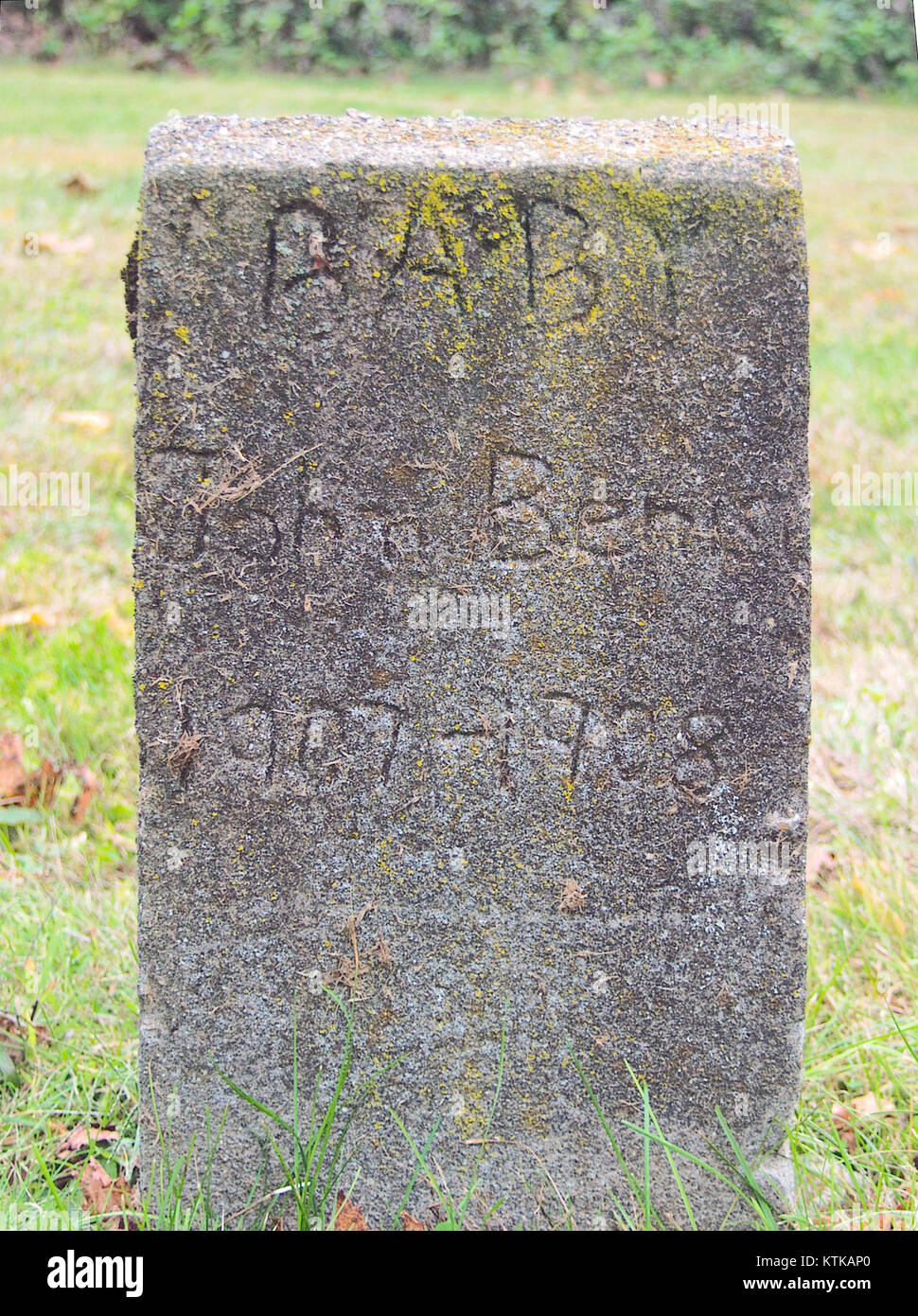 The image captures a gravestone at Chartiers Cemetery, with a focus on ...