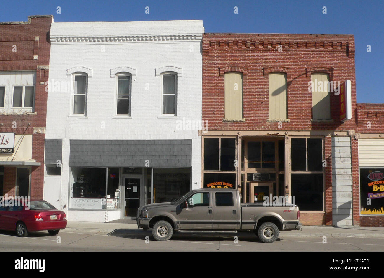 A photograph capturing the buildings located at 914 and 916 Central ...