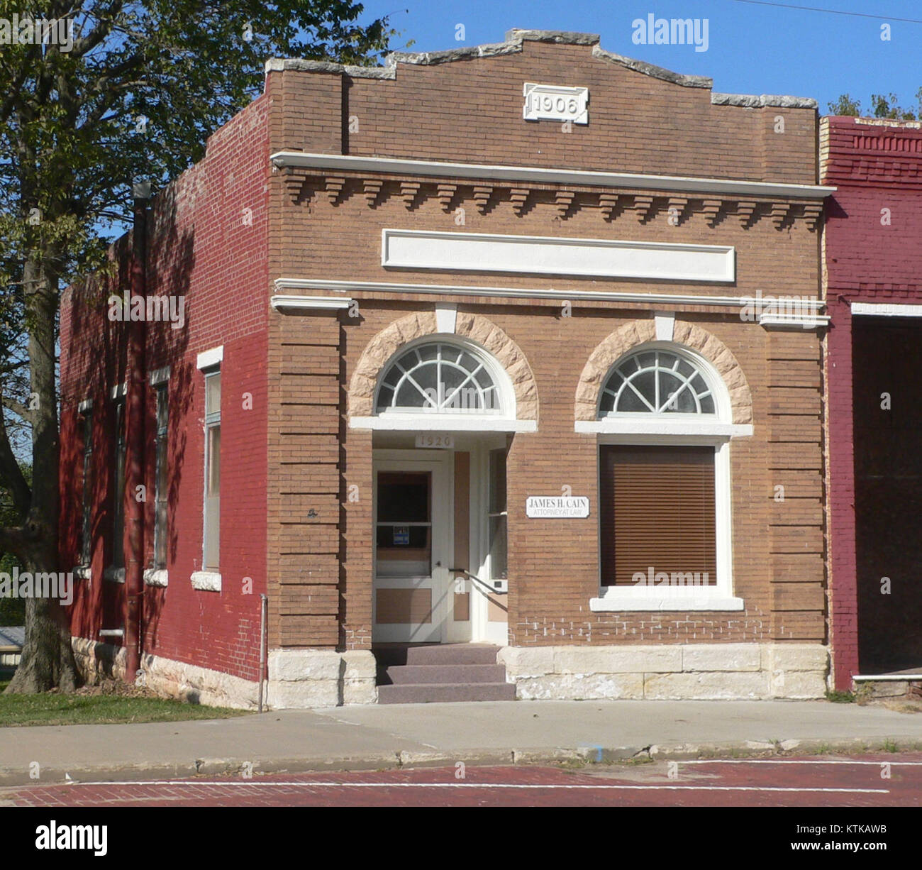 A historical photograph of O Street in Auburn, Nebraska, taken in 1920 ...