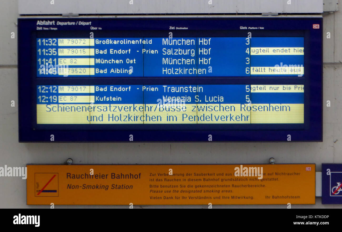 This image depicts the departure board at Rosenheim Station, Germany ...