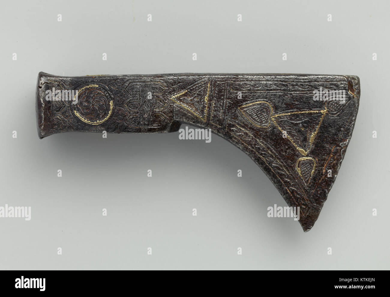 This ancient axe head, displayed at the Metropolitan Museum of Art, is ...