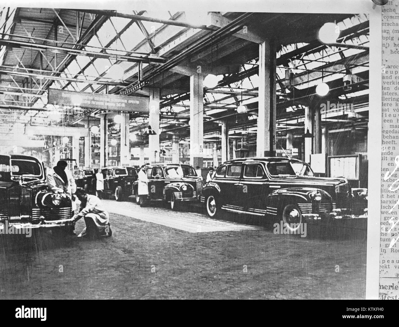 A historical photograph showing an automobile factory in Russia ...