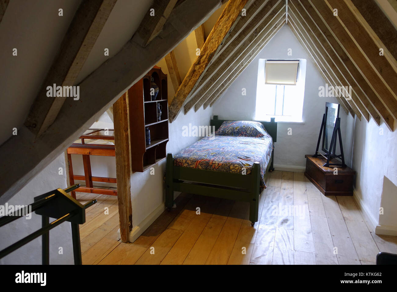 The attic bedroom at Kelmscott Manor in Oxfordshire, England, is a ...