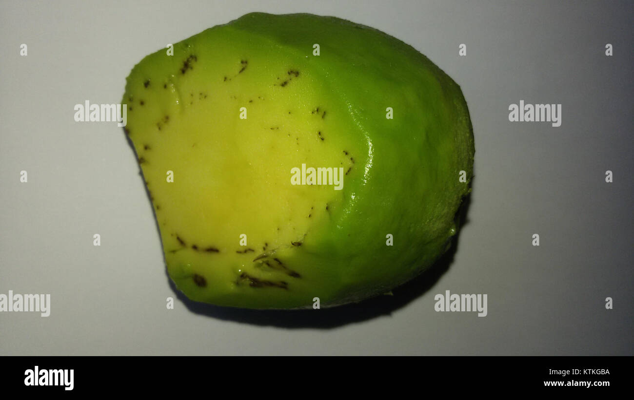 This image shows the flesh of an avocado, which is characterized by its ...