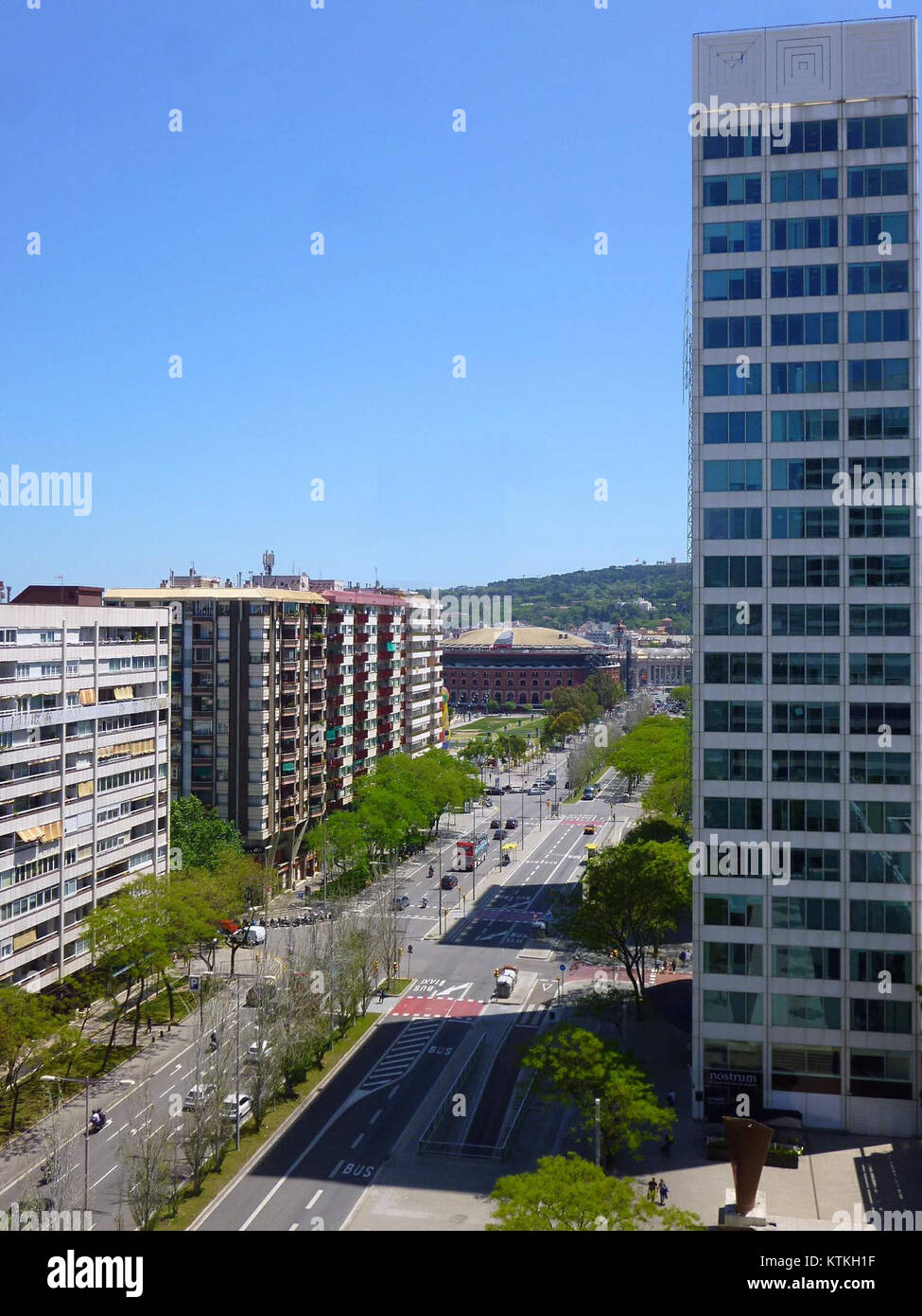 This image depicts the Carrer de Tarragona and the Edificio Tarragona in Barcelona, Spain. The ...