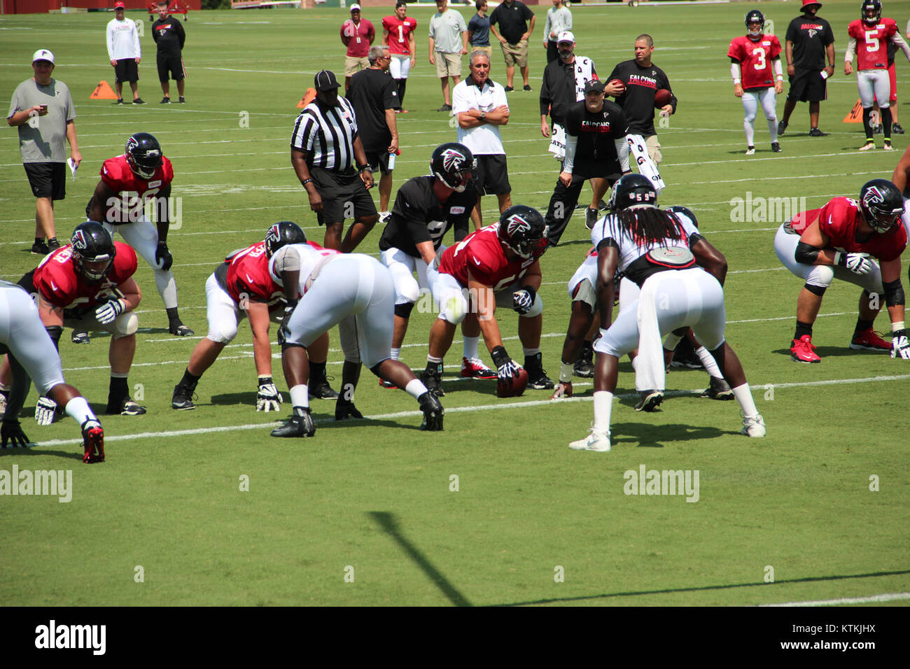 The image captures a moment from the Atlanta Falcons' training camp ...