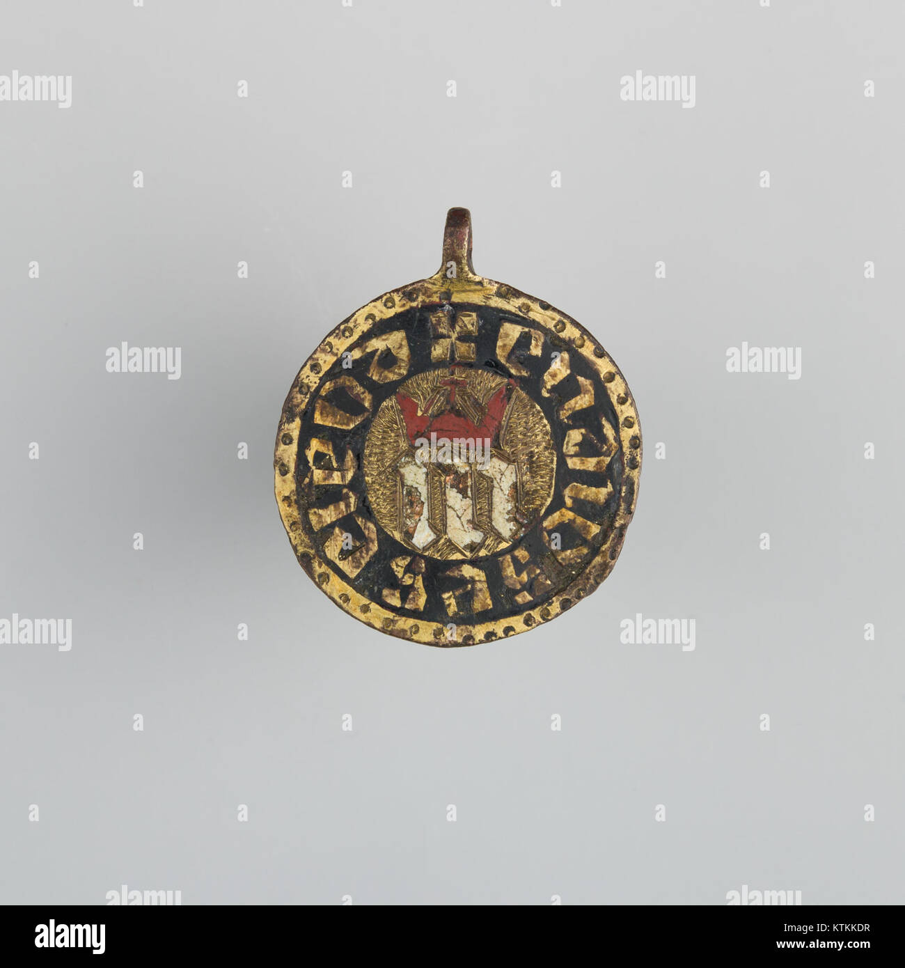 This badge, likely from a horse harness, is a historical artifact with ...