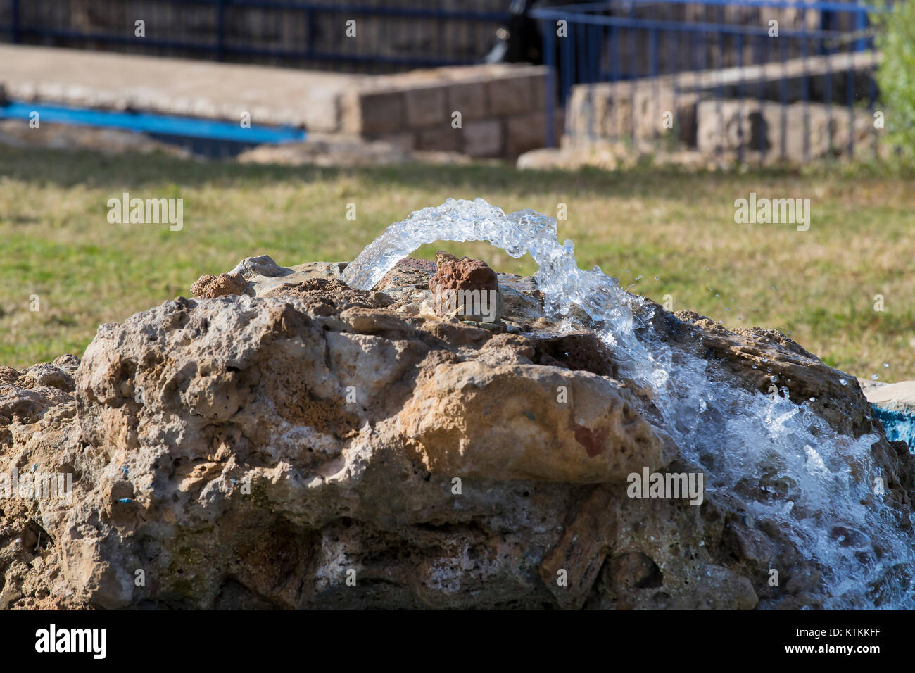 A source of pure mineral water from a stone Stock Photo - Alamy