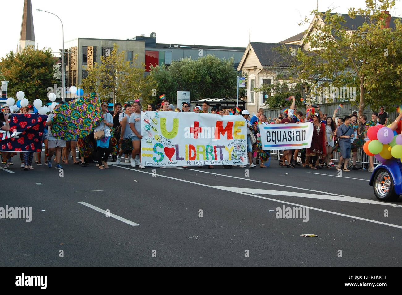 A photograph capturing a moment from the Auckland Pride Parade held in ...