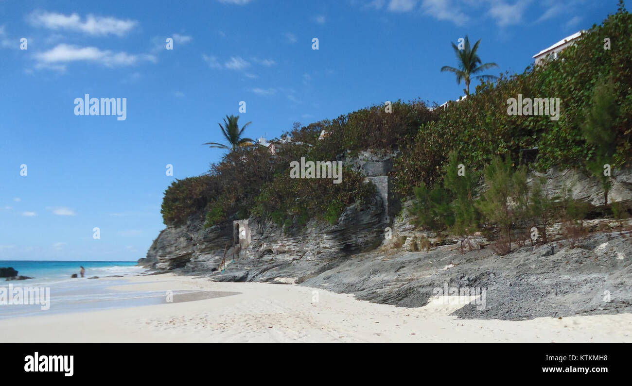 This photograph captures a scenic beach view in Bermuda, showcasing its ...