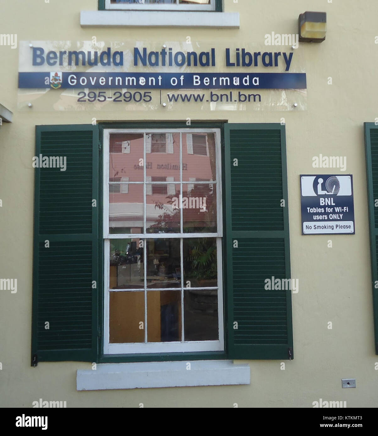 This image shows a sign above the Bermuda National Library, located in ...