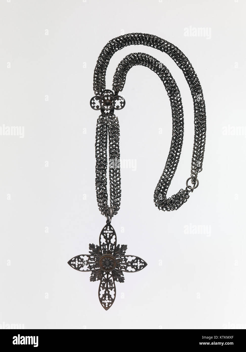 This Berlin ironwork necklace, featuring a cross pendant, is a piece of ...