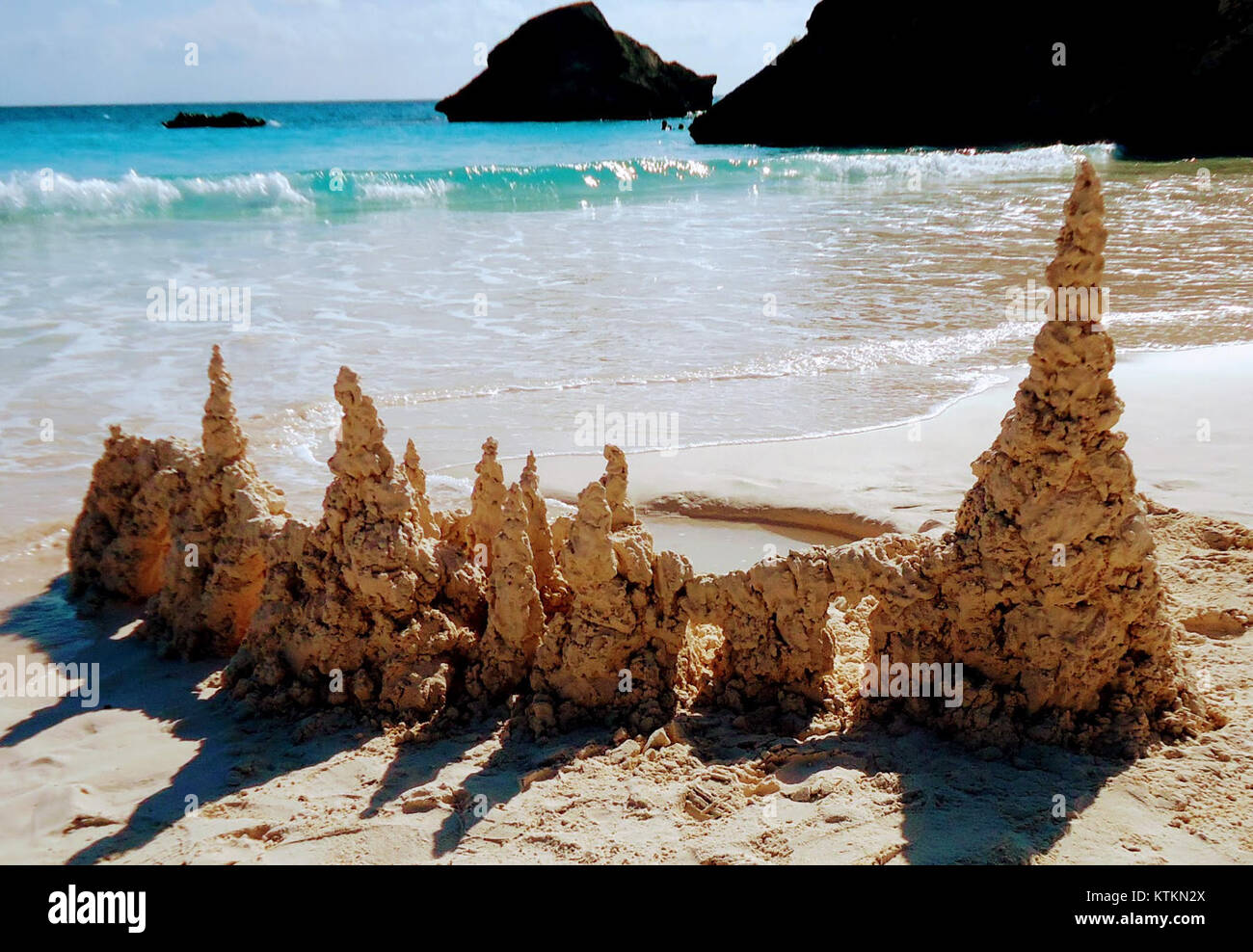 This image captures a sandcastle on Horseshoe Bay beach in Bermuda. The ...