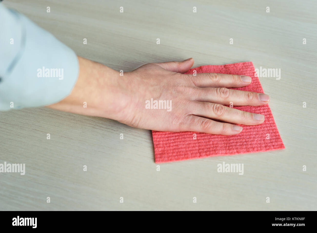 Woman cleaner cleaning table using hi-res stock photography and images ...