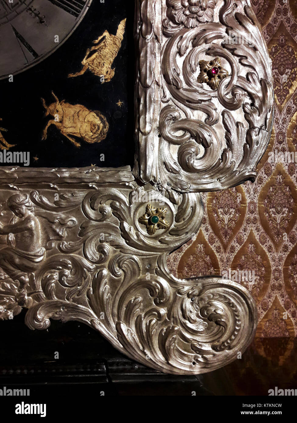 The Augsburg table clock, featuring zodiac signs, is a detailed ...