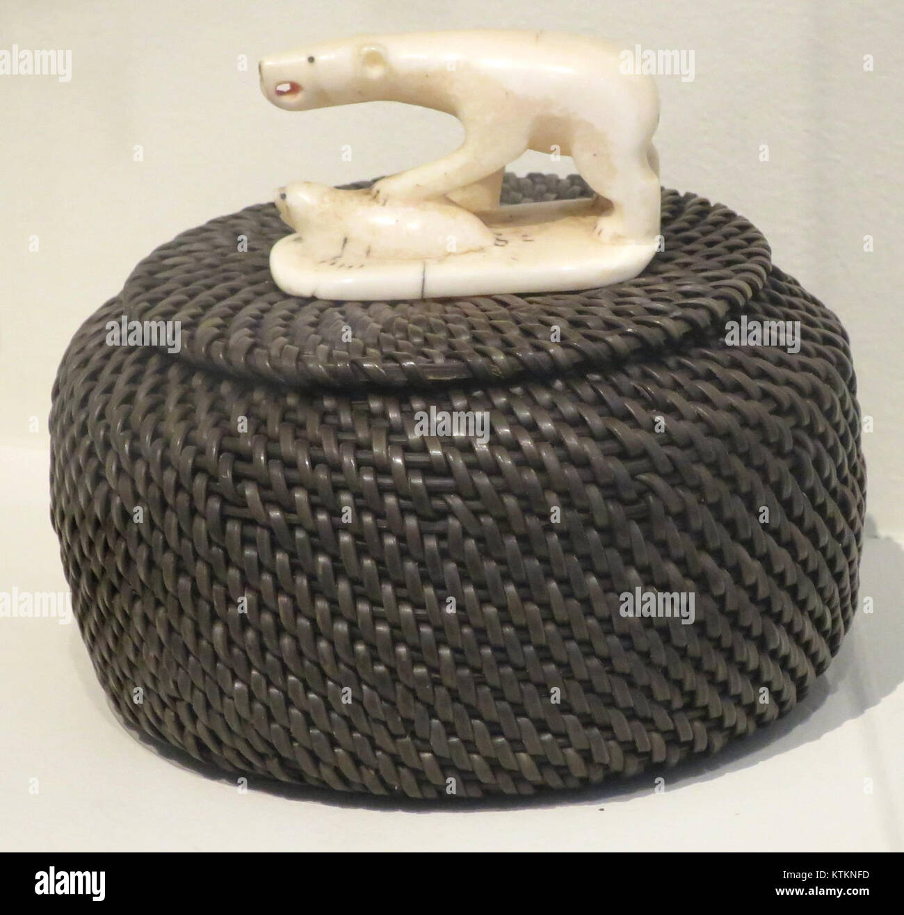 Basket with bear and seal carving by George Omnik, Point Hope, Alaska ...