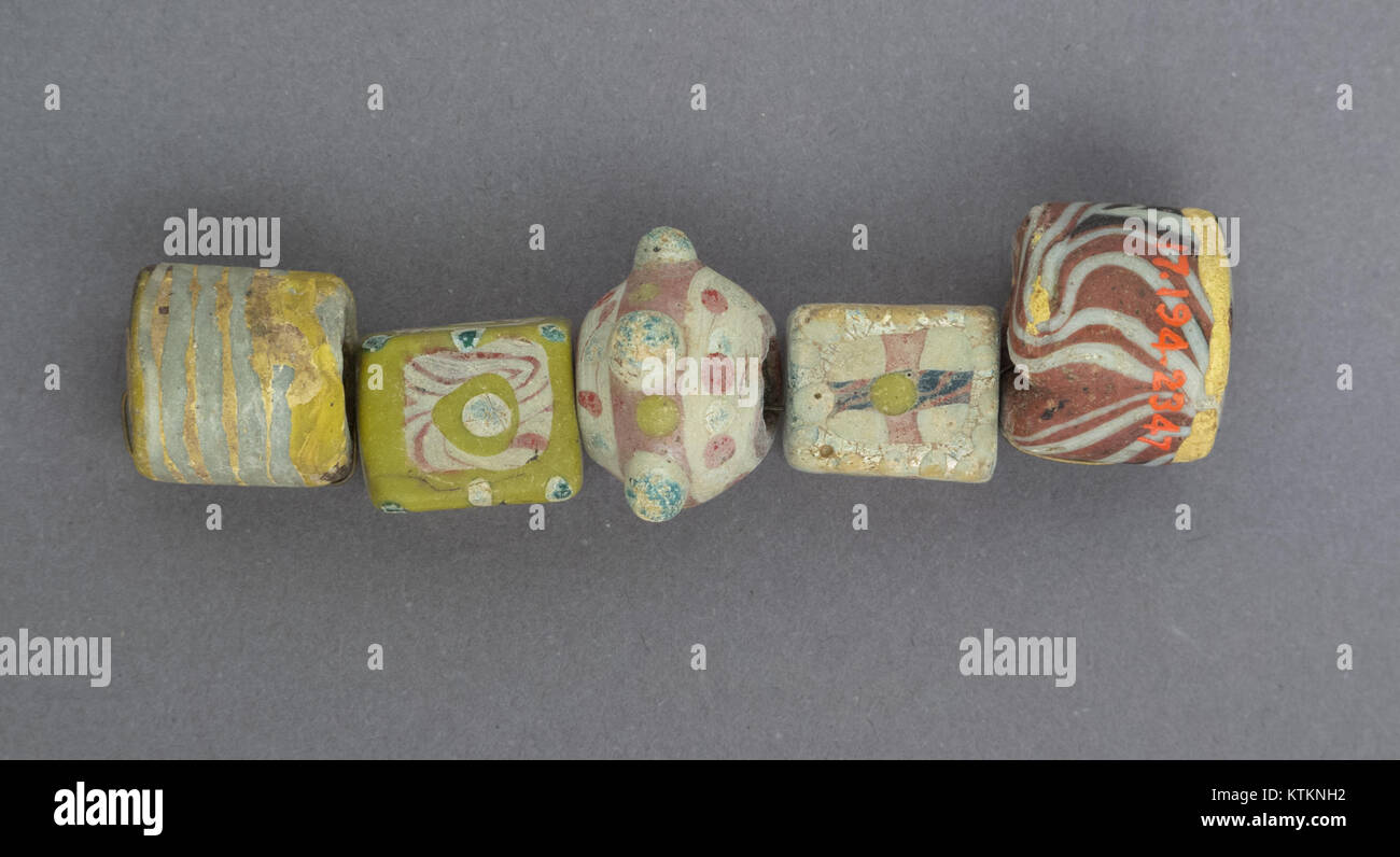 This collection of five beads, housed at the Metropolitan Museum of Art ...