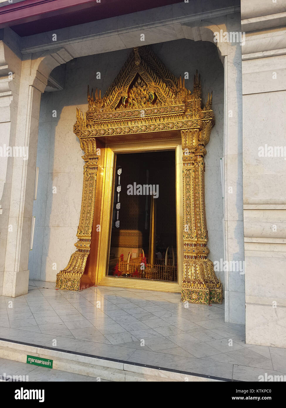 This image shows the Bangkok City Pillar, a significant spiritual site ...