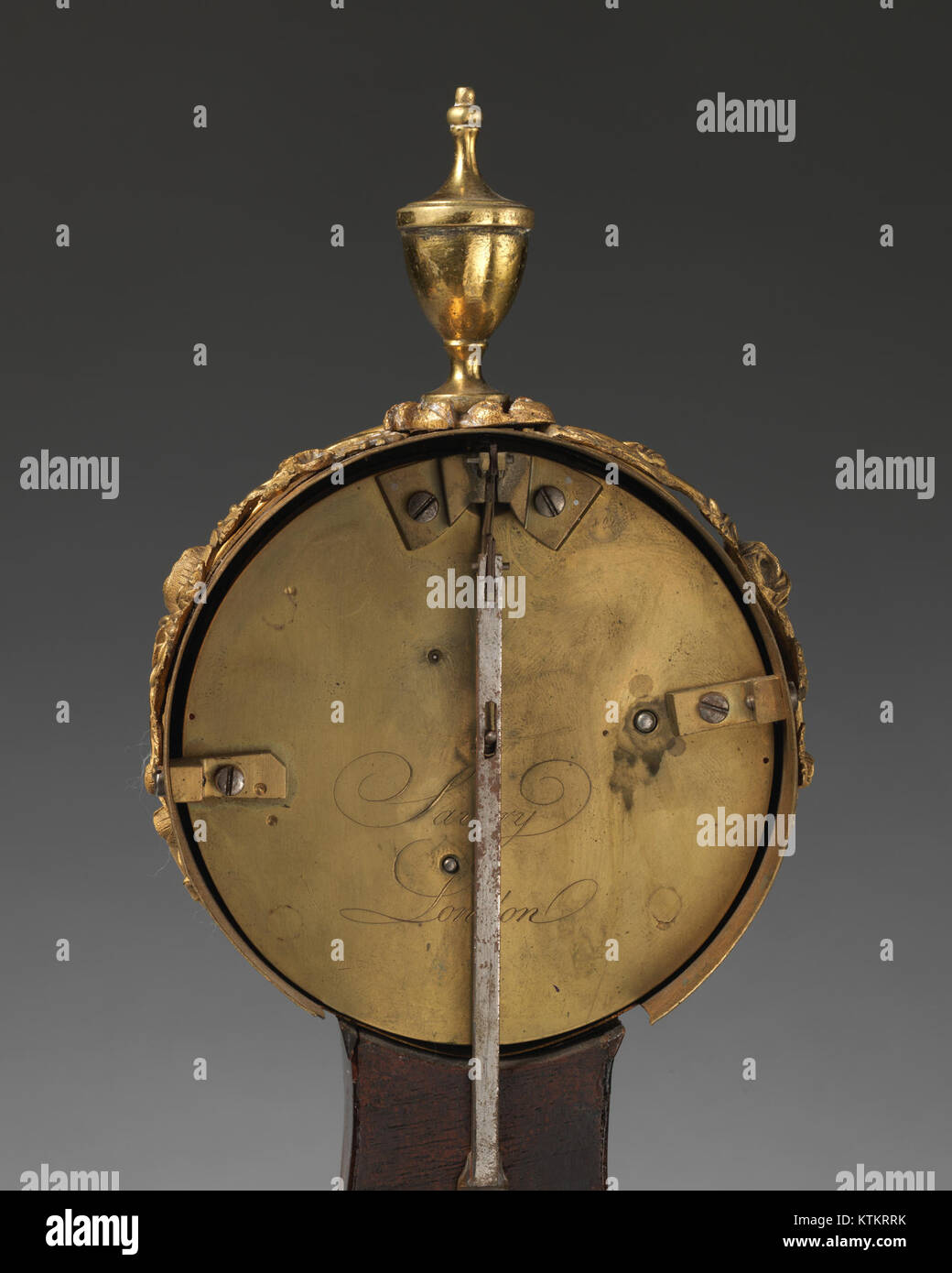 This image showcases a Balloon bracket clock, a type of antique ...