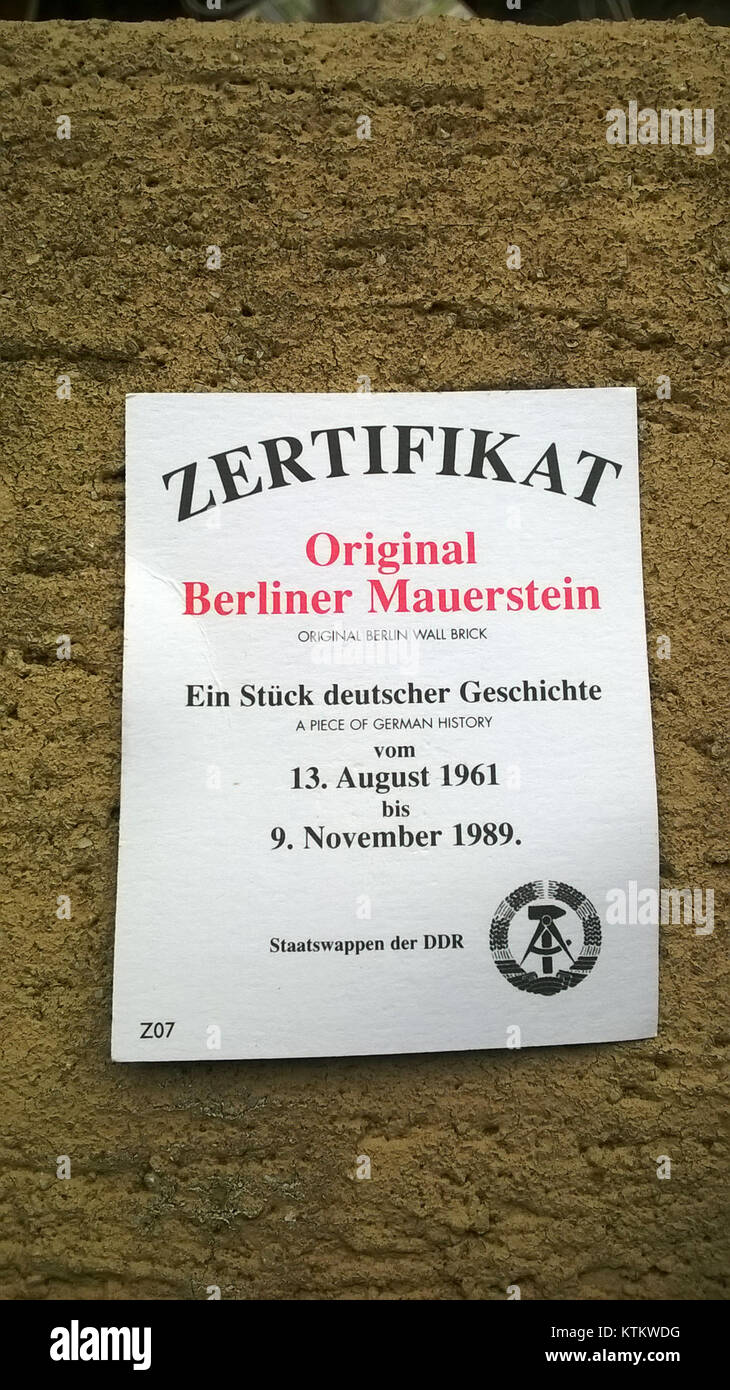 A certificate of authenticity for a piece of the Berlin Wall, verifying ...