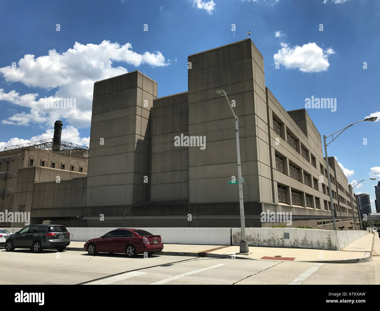 This image shows the Baltimore Central Booking & Intake Center, a ...