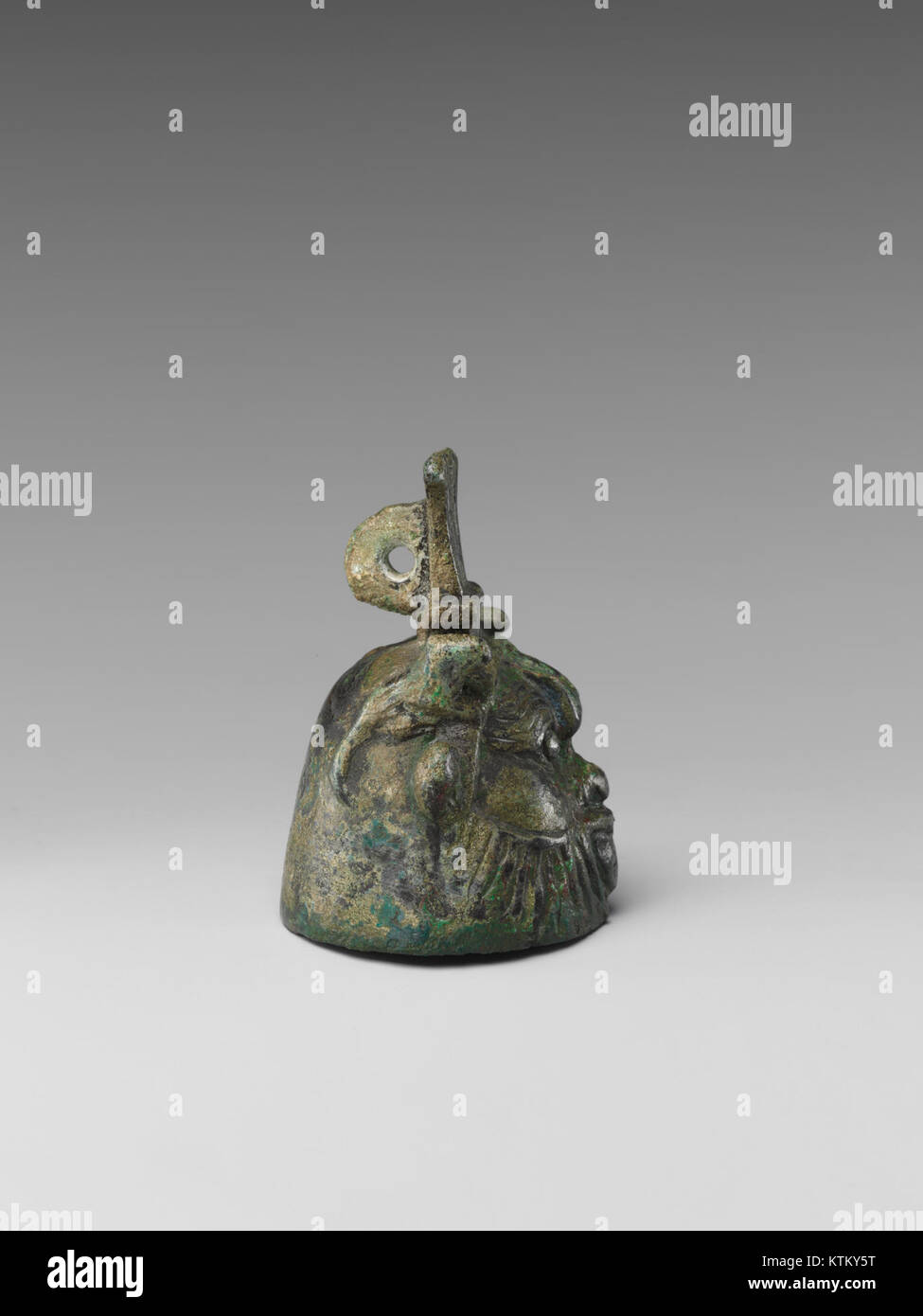 This bell is designed in the form of Bes, an ancient Egyptian deity ...