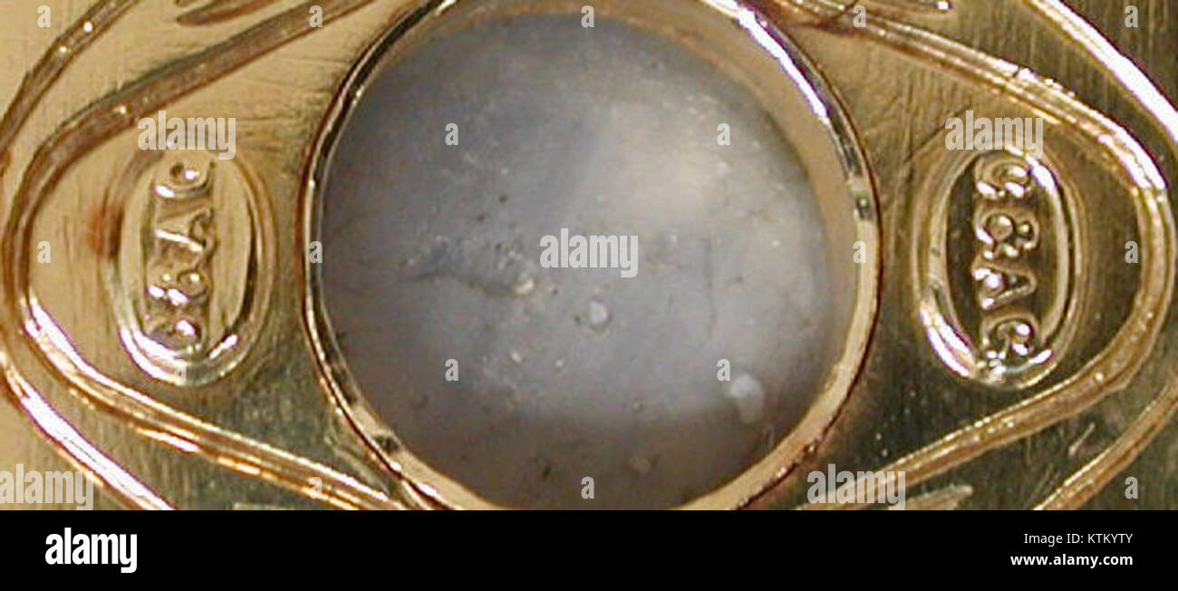 A belt buckle identified by the MET SF2014 713 7ab mark, is part of a ...