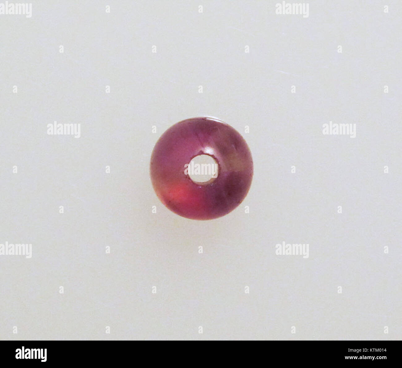 These beads, part of the MET collection (sf74513621), represent ...