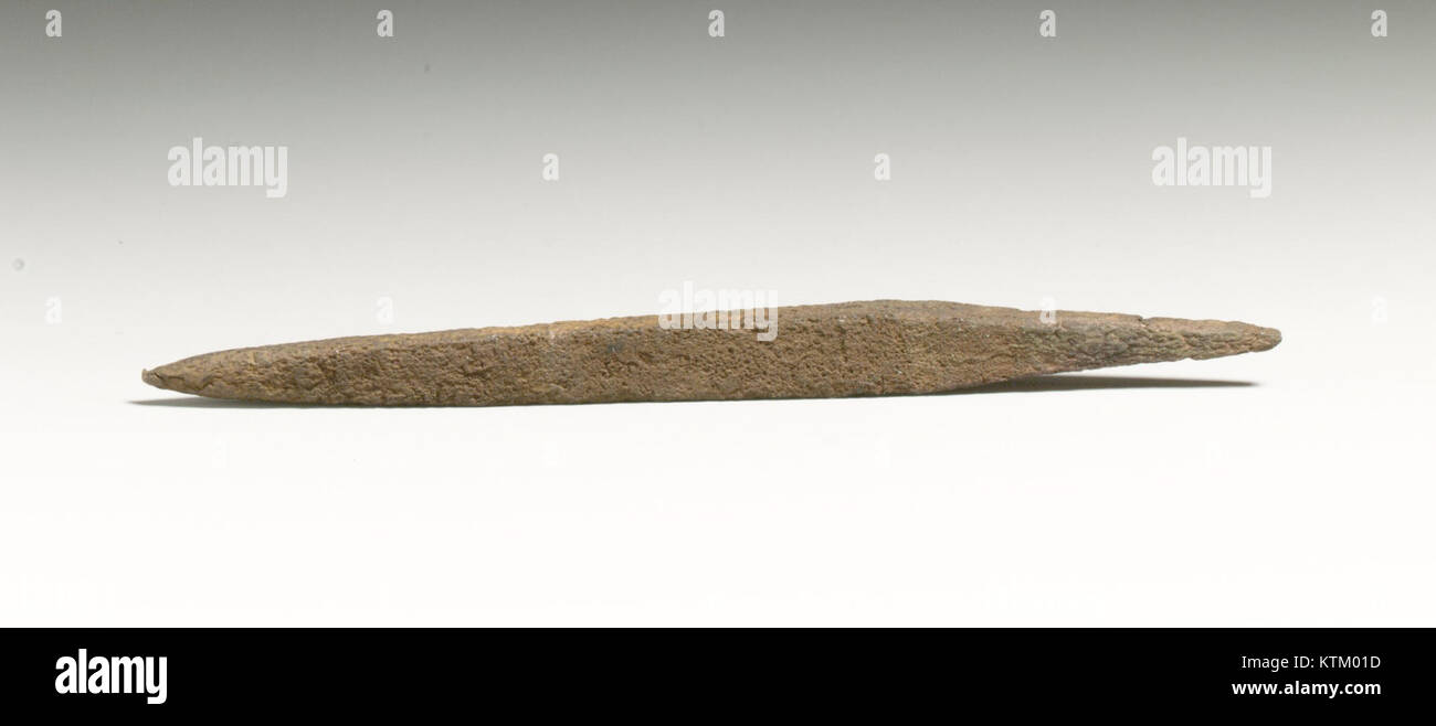 This image features an awl, a tool traditionally used for piercing or ...
