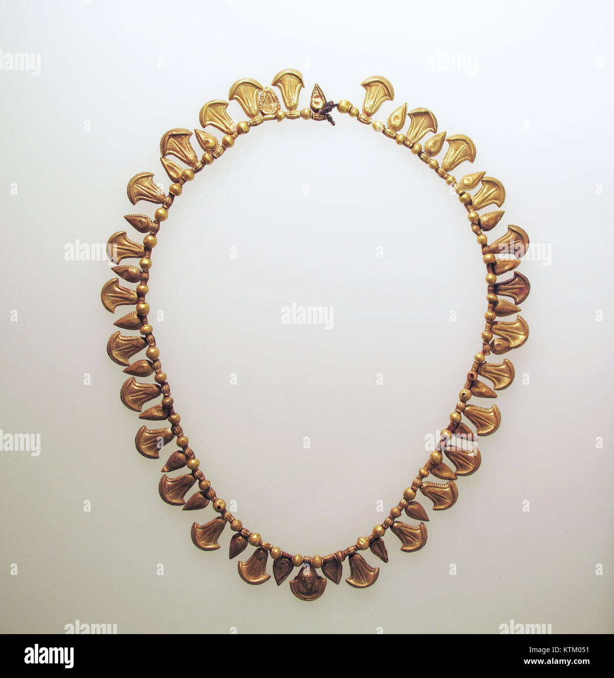 This bead pendant, displayed at the Metropolitan Museum of Art ...