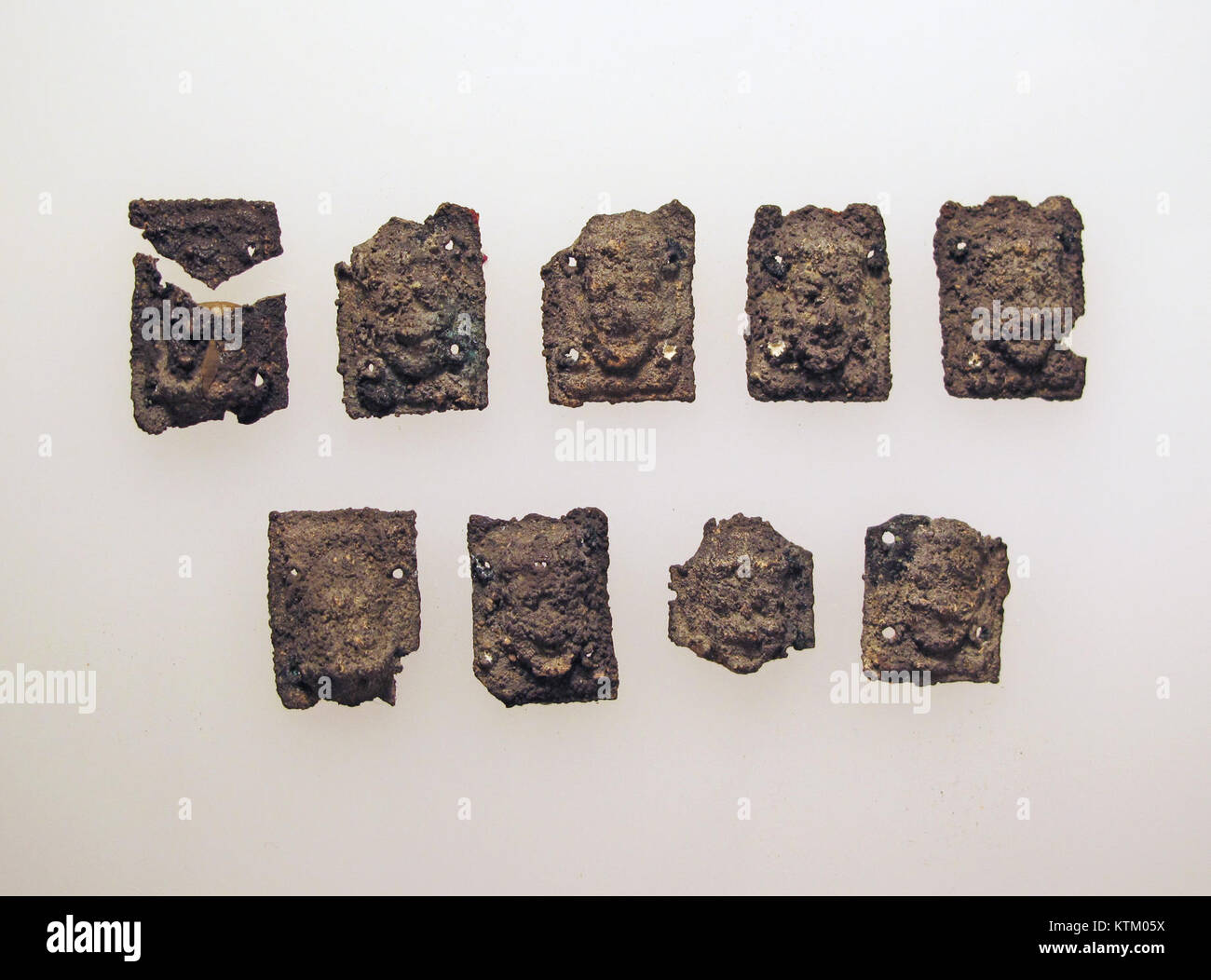 This artifact features beads with a female head, housed at the ...