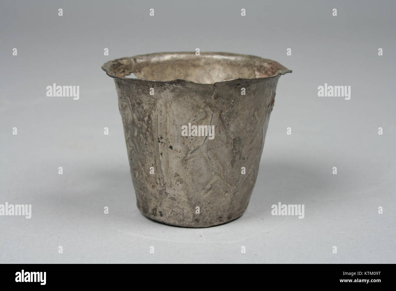 This beaker, dated to the ancient world and displayed in the ...