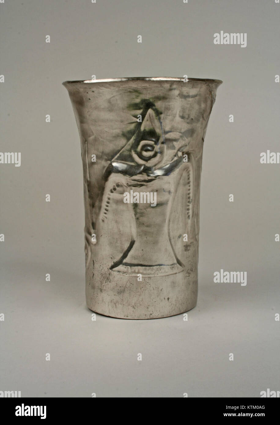 This beaker, titled 'Birds', is part of the collection at the ...