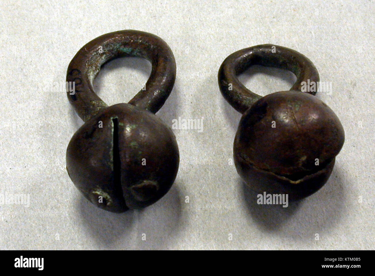 A Bell dangle from the MET collection, numbered VS64 228 699 700 ...