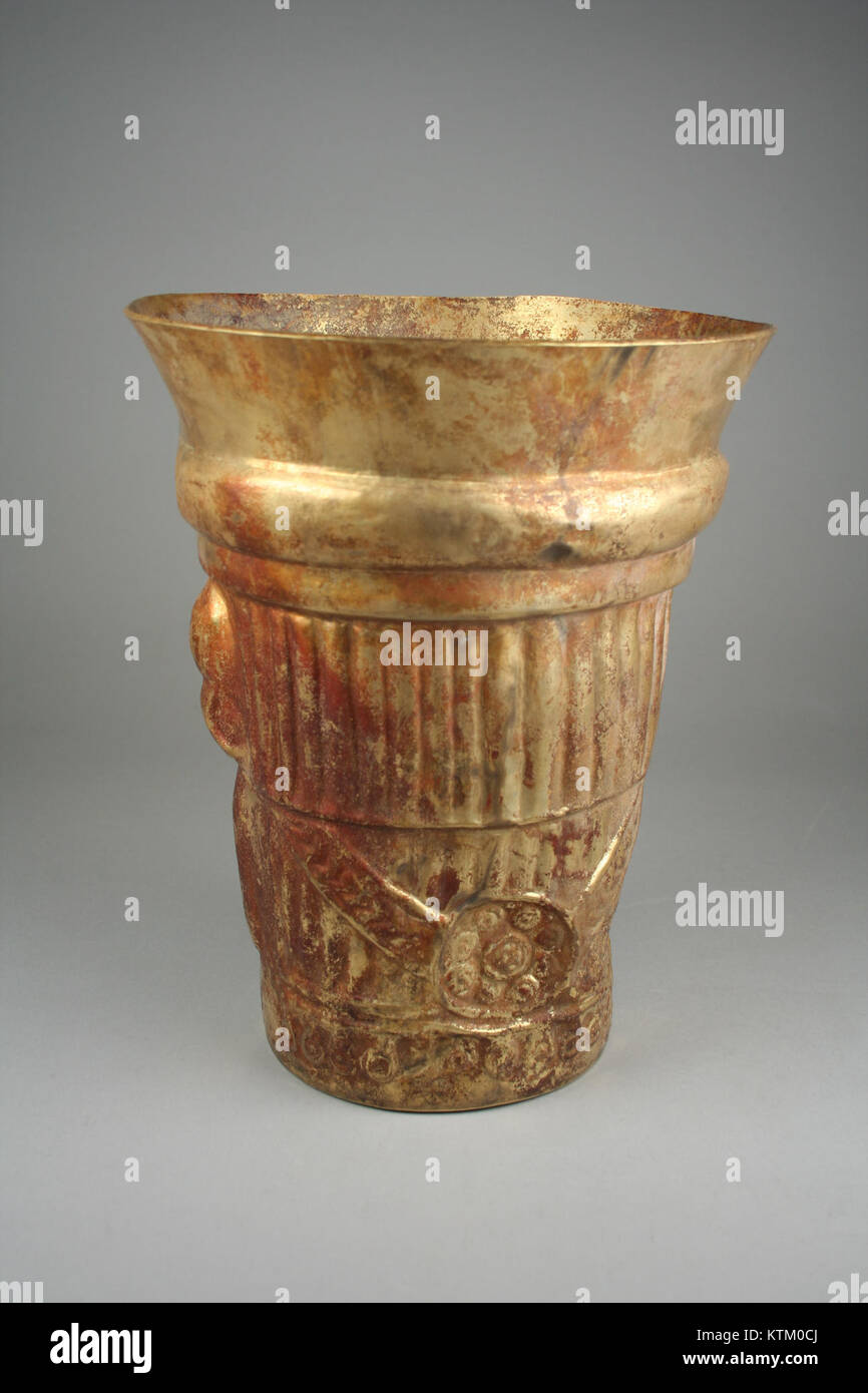 This beaker, featuring a figure with a shell, is part of the collection ...