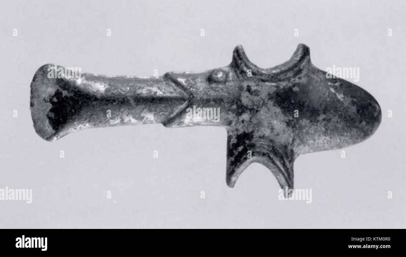 Axe head from the Middle East, dated to the Iron Age, featuring a ...