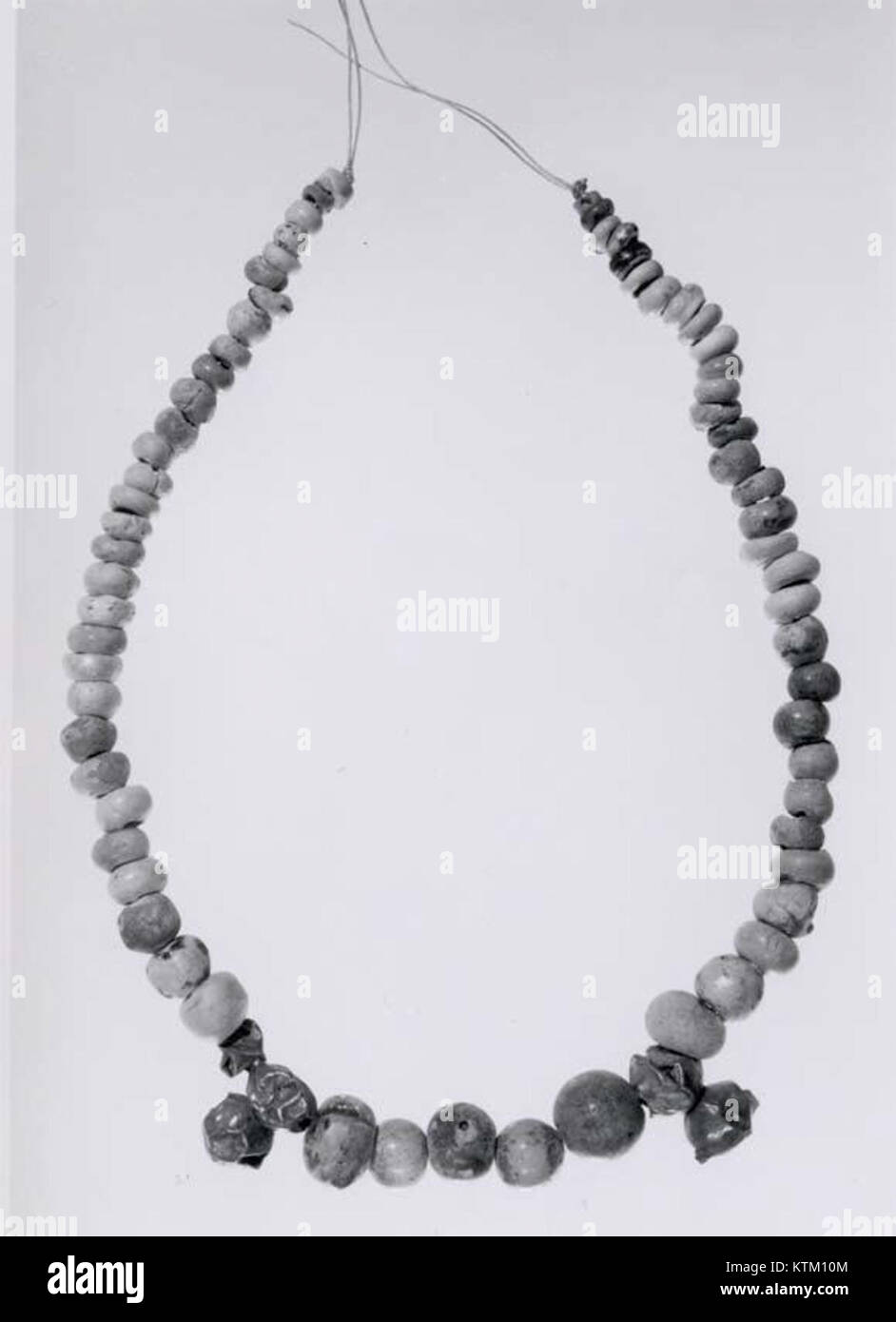 This image features a collection of beads from the MET collection. The ...